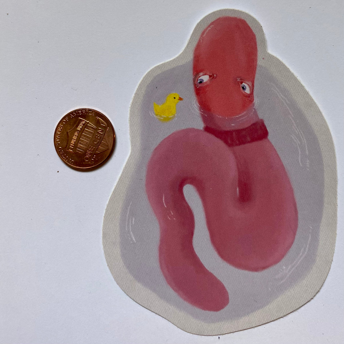 Worm in a puddle (sticker) – the stuff bre makes